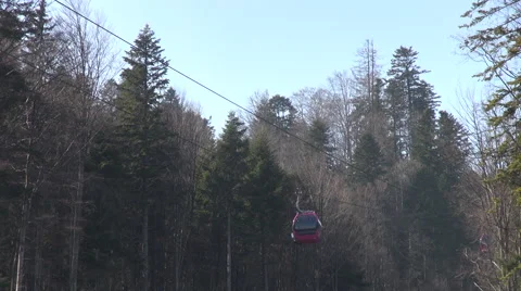 Gondola lift with cable car, pylon and w... | Stock Video | Pond5