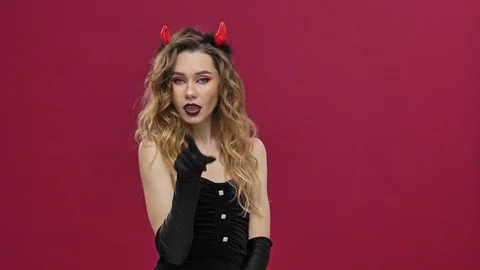 Good-looking devil woman in carnival cos... | Stock Video | Pond5