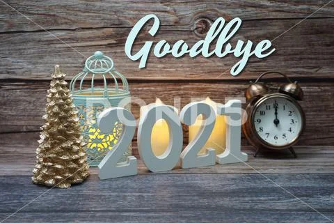 Photograph: Goodbye 2021 calligraphy alphabet letter and Christmas tree ...