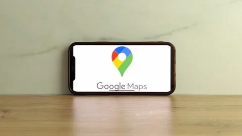 Google Maps logo displayed on mobile pho... | Stock Video | Pond5