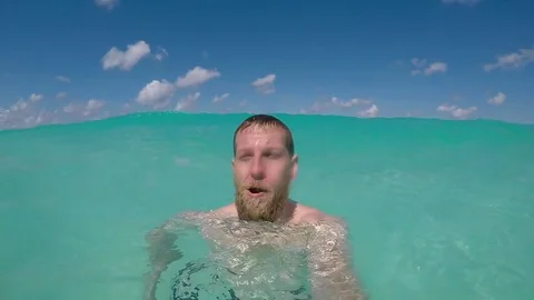 gopro selfie ocean wave over mans head s... | Stock Video | Pond5