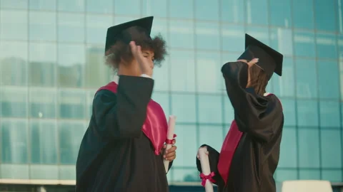 Graduates in the Mantle and Cap Giving H... | Stock Video | Pond5