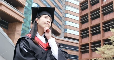 Graduation woman thinking of future | Stock Video | Pond5