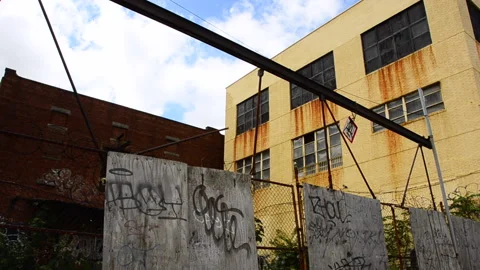 Graffiti and a run down industrial build... | Stock Video | Pond5