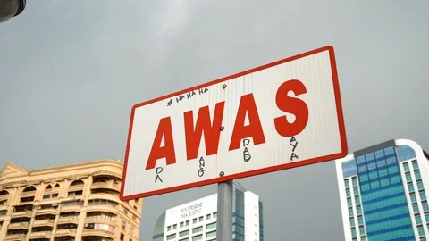 Graffiti painted on an Awas sign board | Stock Video | Pond5