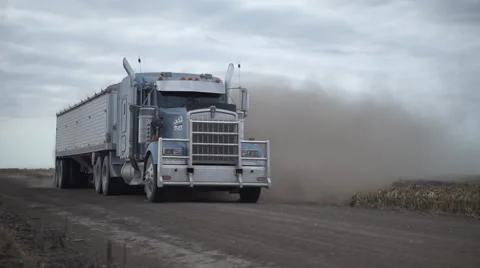Grain Semi Truck on Dirt Road | Stock Video | Pond5