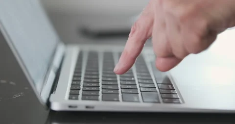 Grandma is very slow at typing on comput... | Stock Video | Pond5