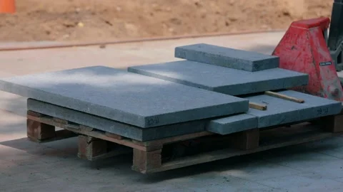 Granite tiles. Pallet with granite tiles... | Stock Video | Pond5