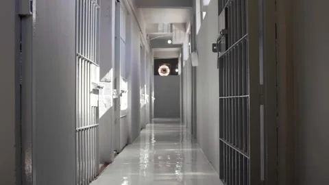 Gray hallway full of empty prison jail c... | Stock Video | Pond5