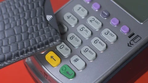 gray terminal in the store girl pays by ... | Stock Video | Pond5