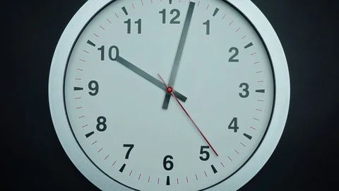 Gray wall clock isolated 10 o'clock on b... | Stock Video | Pond5