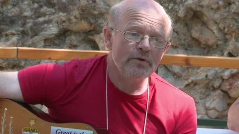 Great IsThe Lord As Man Plays Guitar Til... | Stock Video | Pond5