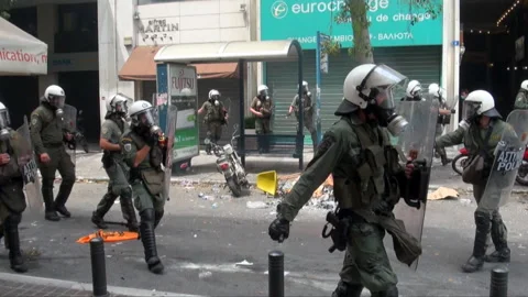 Greek riot police carrying shields, wear... | Stock Video | Pond5