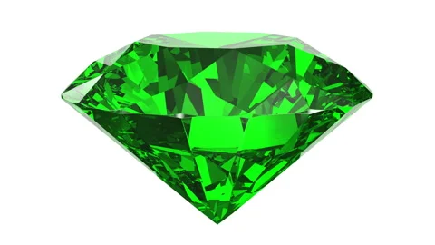 Green emerald rotating on a white backgr... | Stock Video | Pond5