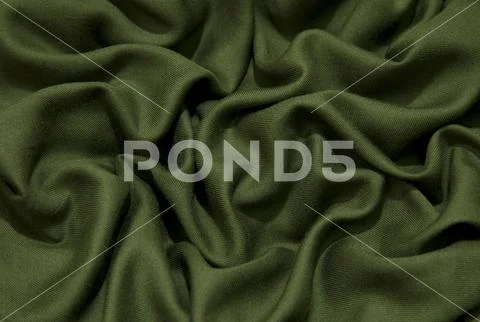 Green fabric background. Green cloth waves background texture. ~ Premium Photo #284691654