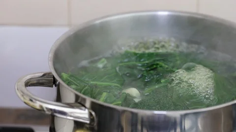 green fresh vegetables boiling in water ... | Stock Video | Pond5