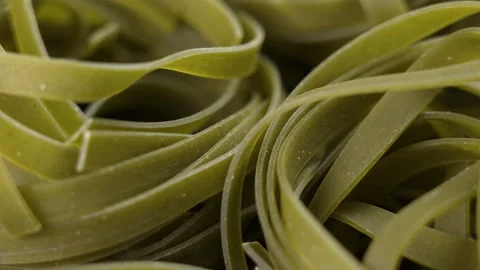 Green Italian nest shaped pasta with spi... | Stock Video | Pond5