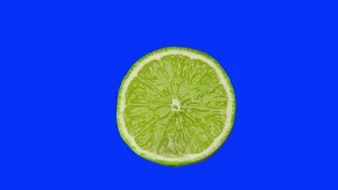 Green Juicy Lemon turning and spinning, ... | Stock Video | Pond5