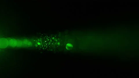 The green laser ray shining on a black b... | Stock Video | Pond5