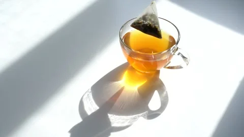 Green Morning Tea. Tea Triangle Bag in a... | Stock Video | Pond5