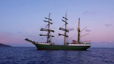 Green sailing ship with folded sails is ... | Stock Video | Pond5