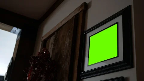A green screen black picture frame hangi... | Stock Video | Pond5