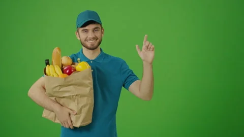 Green Screen Delivery Man Brings Paper B... | Stock Video | Pond5
