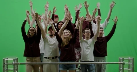 GREEN SCREEN Front view fans wearing re... | Stock Video | Pond5