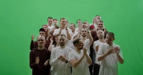 GREEN SCREEN Front view fans wearing re... | Stock Video | Pond5