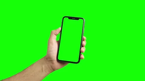 Green screen of hand holding phone green... | Stock Video | Pond5