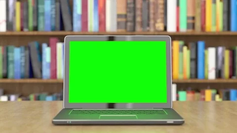 Green Screen Laptop in the Library | Stock Video | Pond5