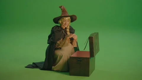 Green Screen. A Magical Girl Opens a Mag... | Stock Video | Pond5