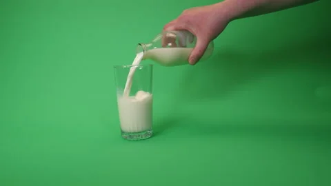 Green screen milk being poured into glas... | Stock Video | Pond5