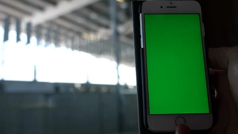 Green screen Mobile phone in hand at pub... | Stock Video | Pond5