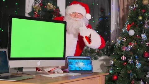 Green screen monitor with Santa peeking ... | Stock Video | Pond5