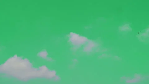 The green screen of moving white clouds ... | Stock Video | Pond5