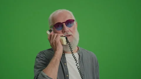 Green Screen. An Old Man is Talking on a... | Stock Video | Pond5