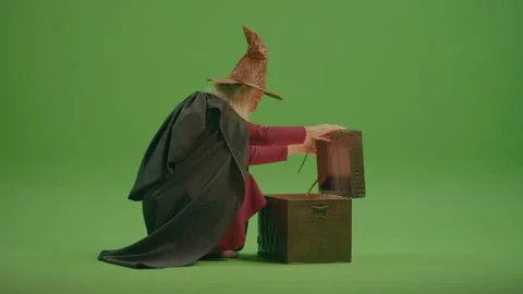 Green Screen. An Old Wizard Opens a Magi... | Stock Video | Pond5