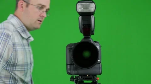 Green screen shot of a photographer in t... | Stock Video | Pond5