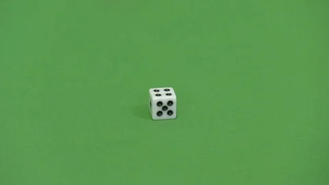 Green screen shot of a white dice rollin... | Stock Video | Pond5