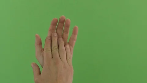 Green screen shot of white male hands cl... | Stock Video | Pond5