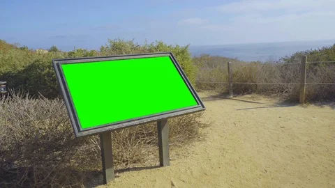 Green screen sign on hiking path | Stock Video | Pond5