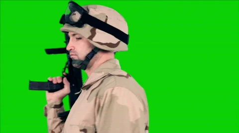 green screen soldier turns to camera | Stock Video | Pond5