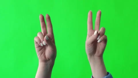 Green screen studio. Two hands show a ge... | Stock Video | Pond5