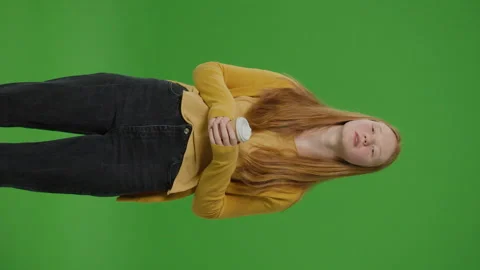 Green Screen.Vertical Video A Serious Te... | Stock Video | Pond5