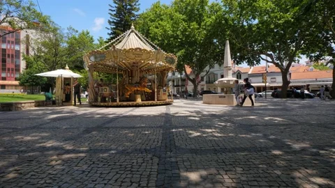 Green trees around square, merry-go-roun... | Stock Video | Pond5