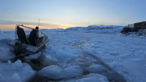 Greenlandic Inuit Eskimo boat stuck in s... | Stock Video | Pond5