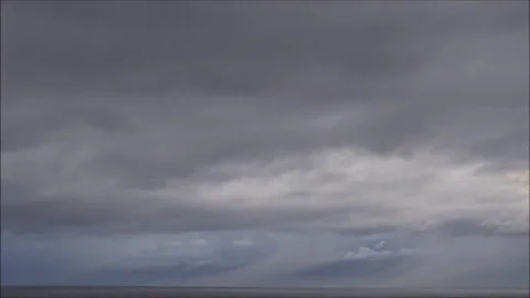 Grey clouds over the ocean time lapse 16... | Stock Video | Pond5
