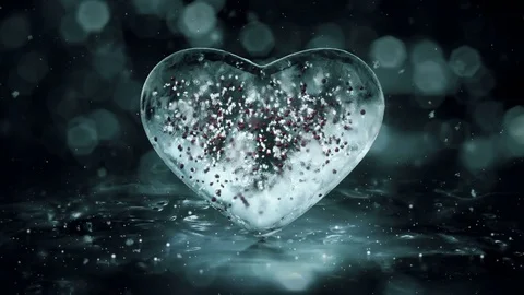 Grey Noir Ice Glass Heart with red balls... | Stock Video | Pond5