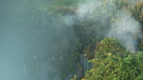 Grey Smoke rising and polluting air from... | Stock Video | Pond5